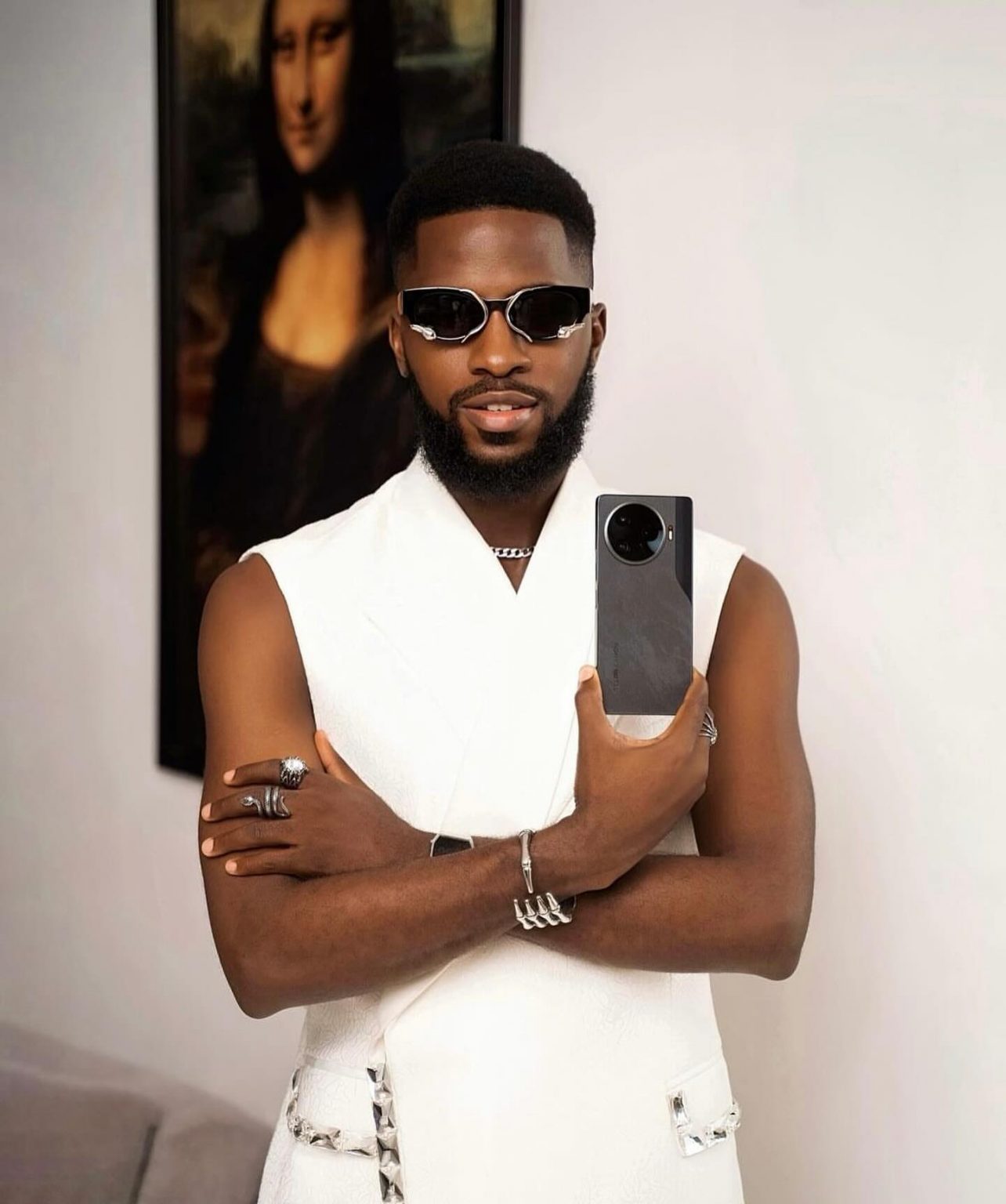 Shop Ivory white “jilted” trio lapel armless jacket - Deji & Kola