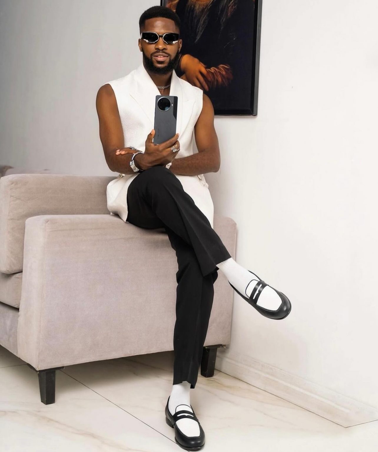 Shop Ivory white “jilted” trio lapel armless jacket - Deji & Kola